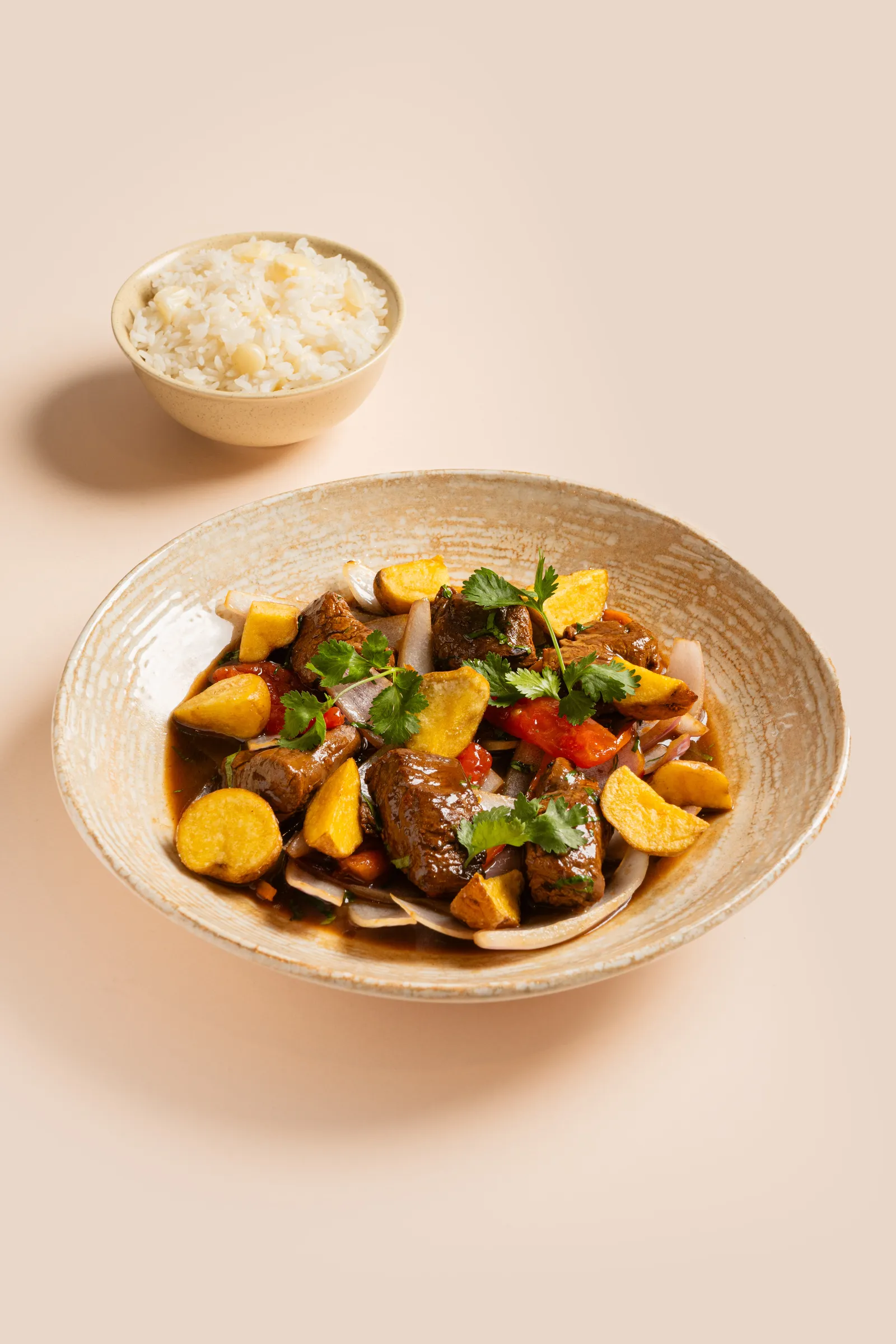 Lomo saltado criollo - La Nacional | Tradición Peruana