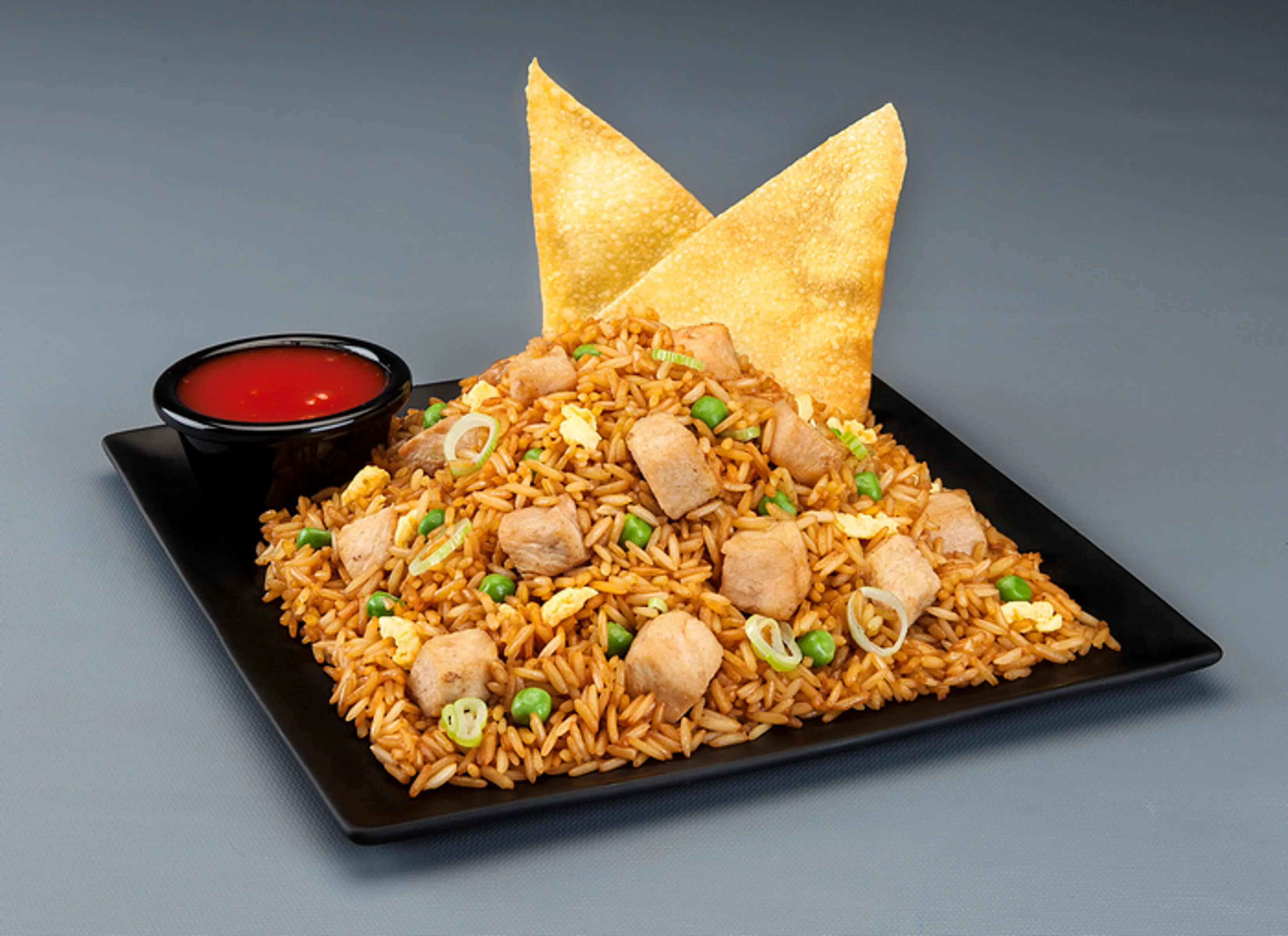 Arroz chaufa de pollo - Delicia Oriental | Gastronomía china premium