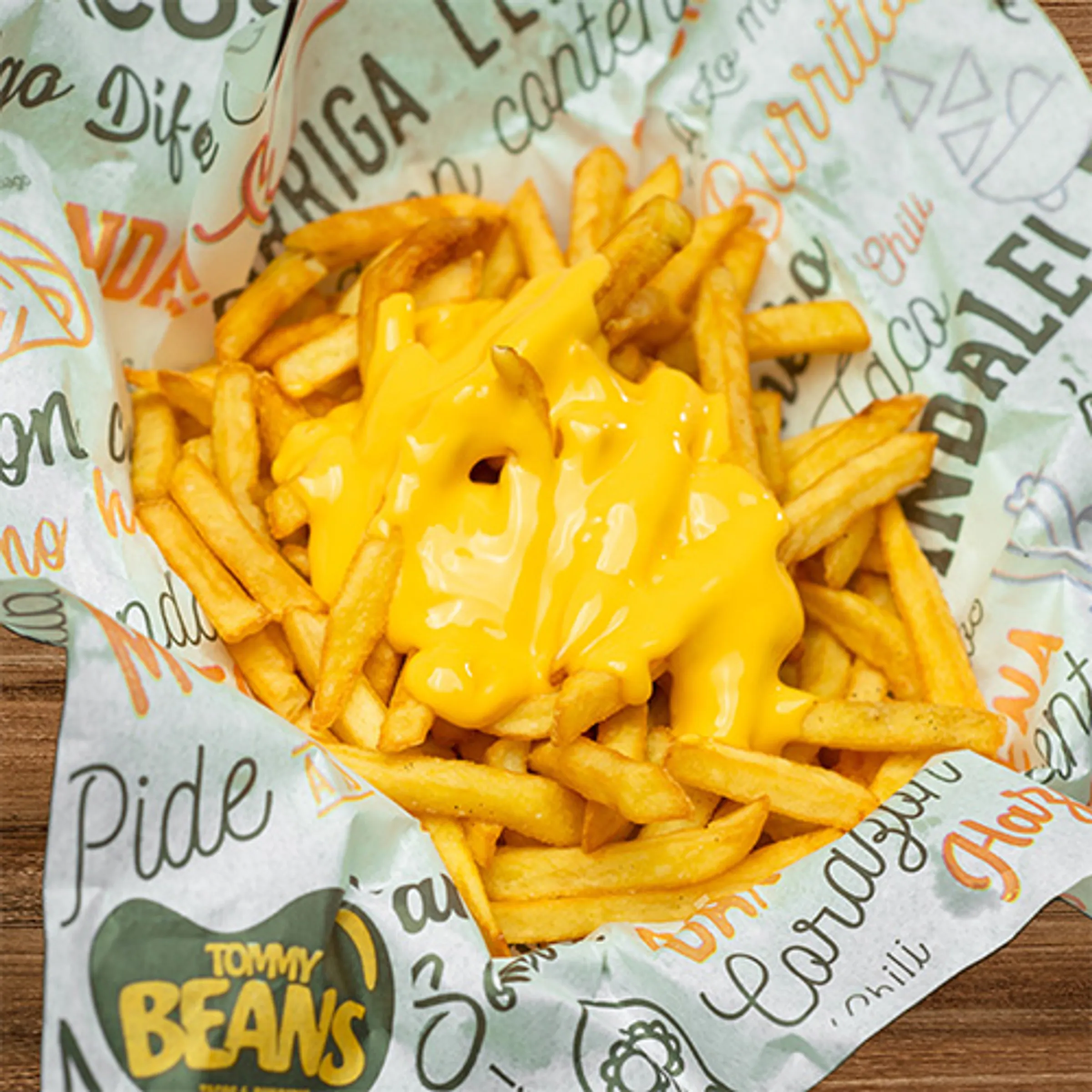Papas Fritas Compartir Cheddar 🧀 - Tommy Beans - Burritos, tacos y bowls