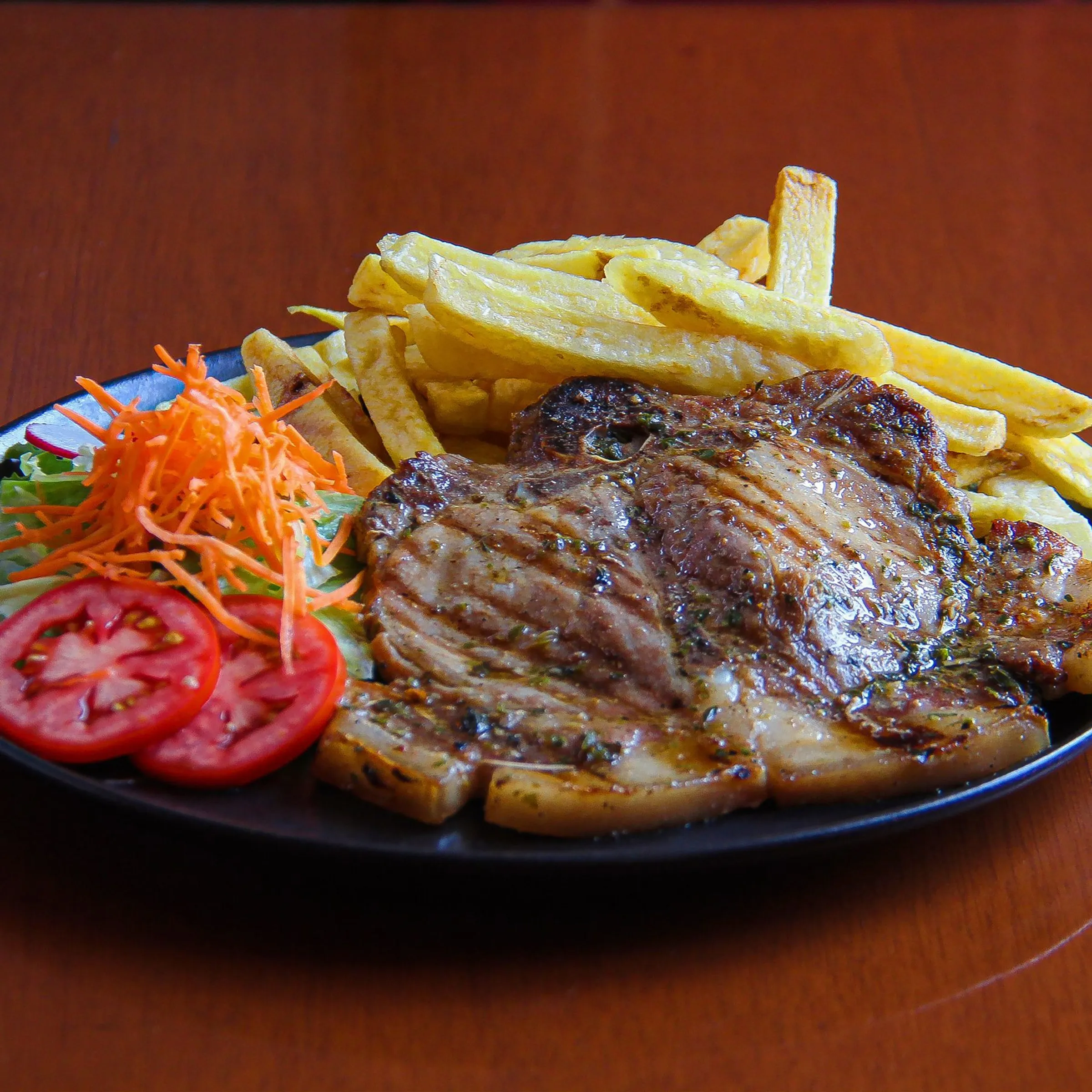 Chuleta lomo cerdo 250 gr - Píkalo | Pollo a la brasa de leña